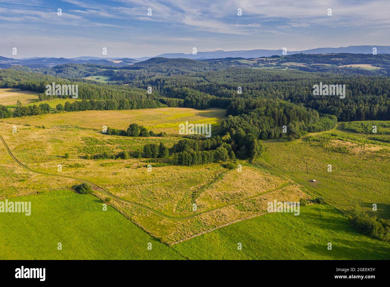 Sudeten foothills. Undulating terrain covered with arable fields ...