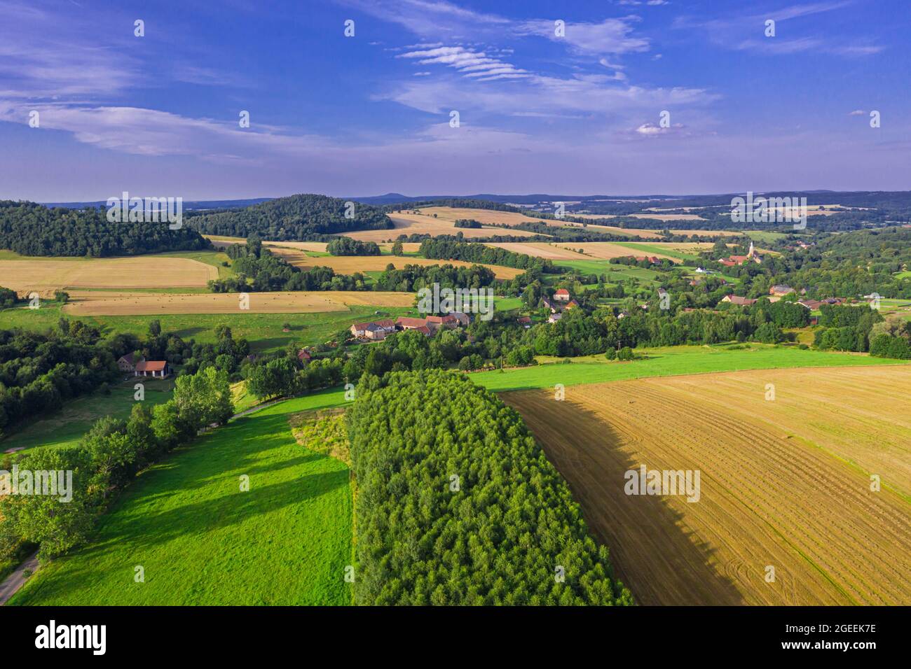 Sudeten foothills. Undulating terrain covered with arable fields ...