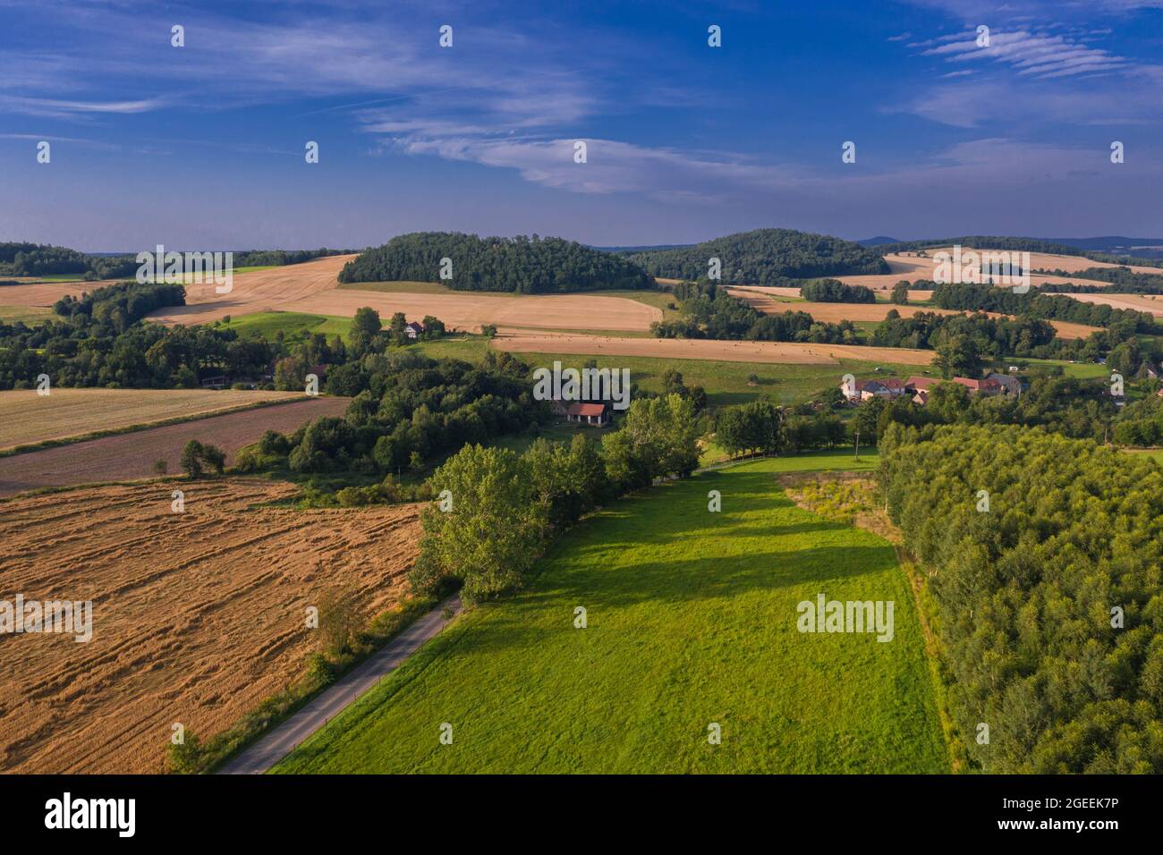 Sudeten foothills. Undulating terrain covered with arable fields ...