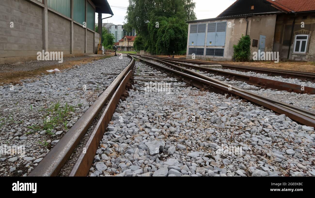 Steel railroad tracks in a rural area Stock Photo - Alamy
