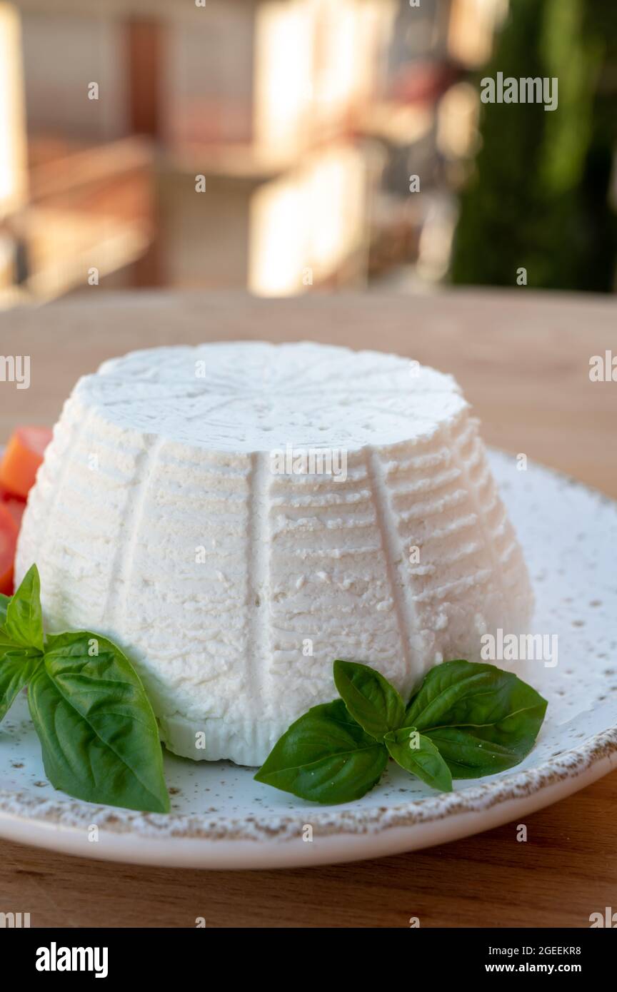 Cheese collection, white Italian soft cheese ricotta served with fresh ...