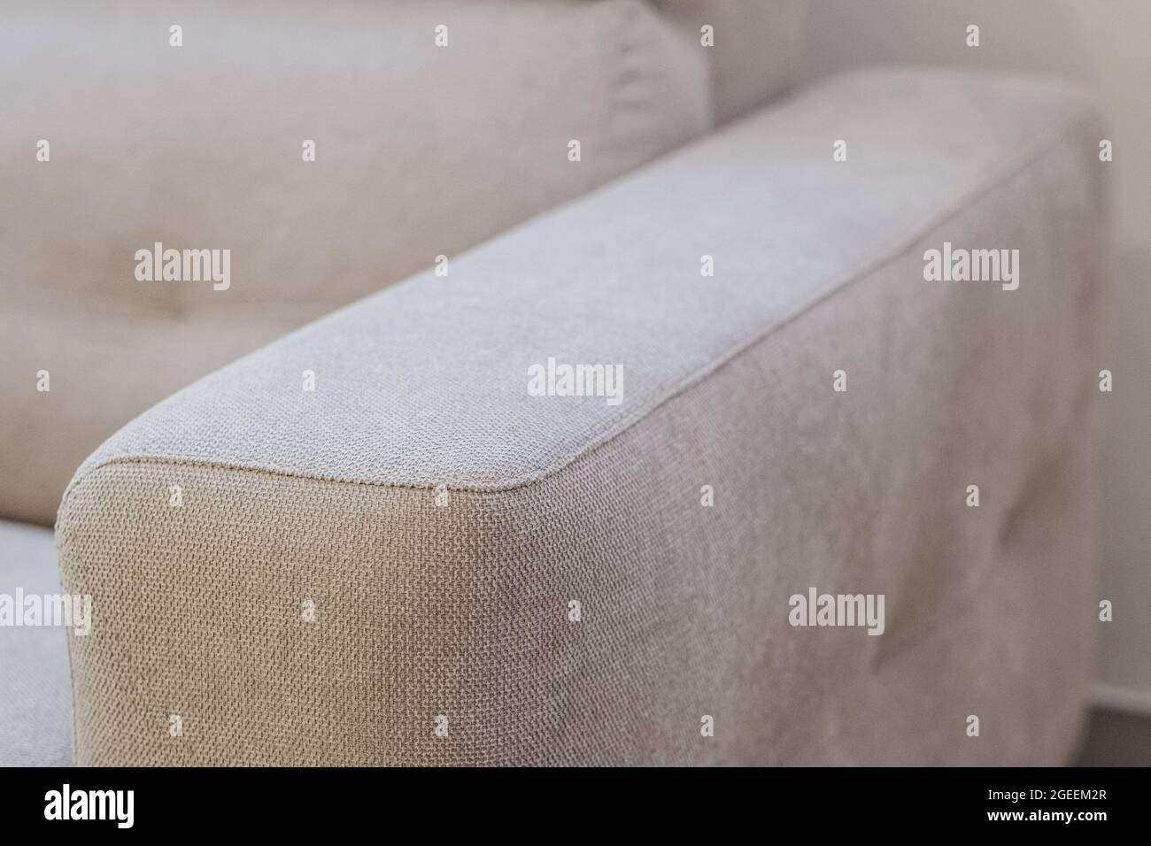 Detail shot of a beige couch in a living room Stock Photo - Alamy