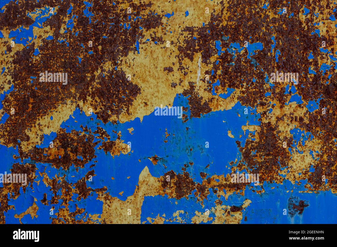 flat texture of rusted steel sheet with two peeled off layers of paint ...