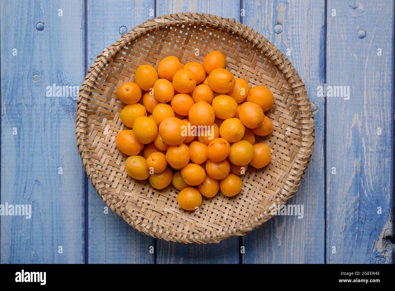 Brazilian fruit caja in the straw basket Stock Photo - Alamy