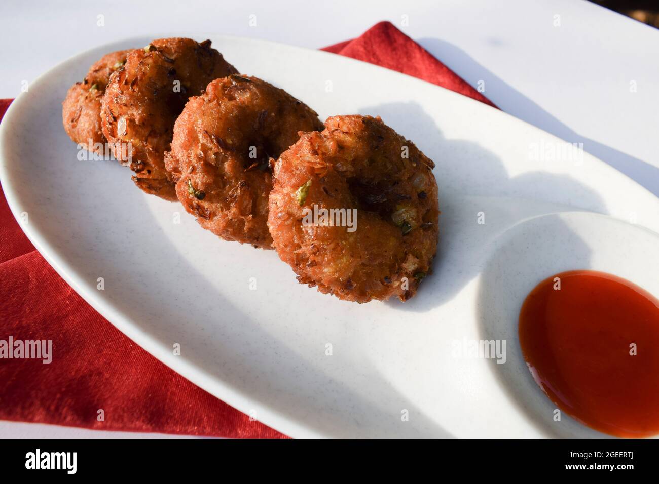 Delicious Poha wada or Poha pakoda also known as Flattened rice and ...