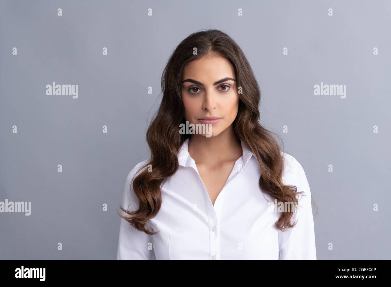 I am a woman. Woman portrait grey background. Career girl face ...