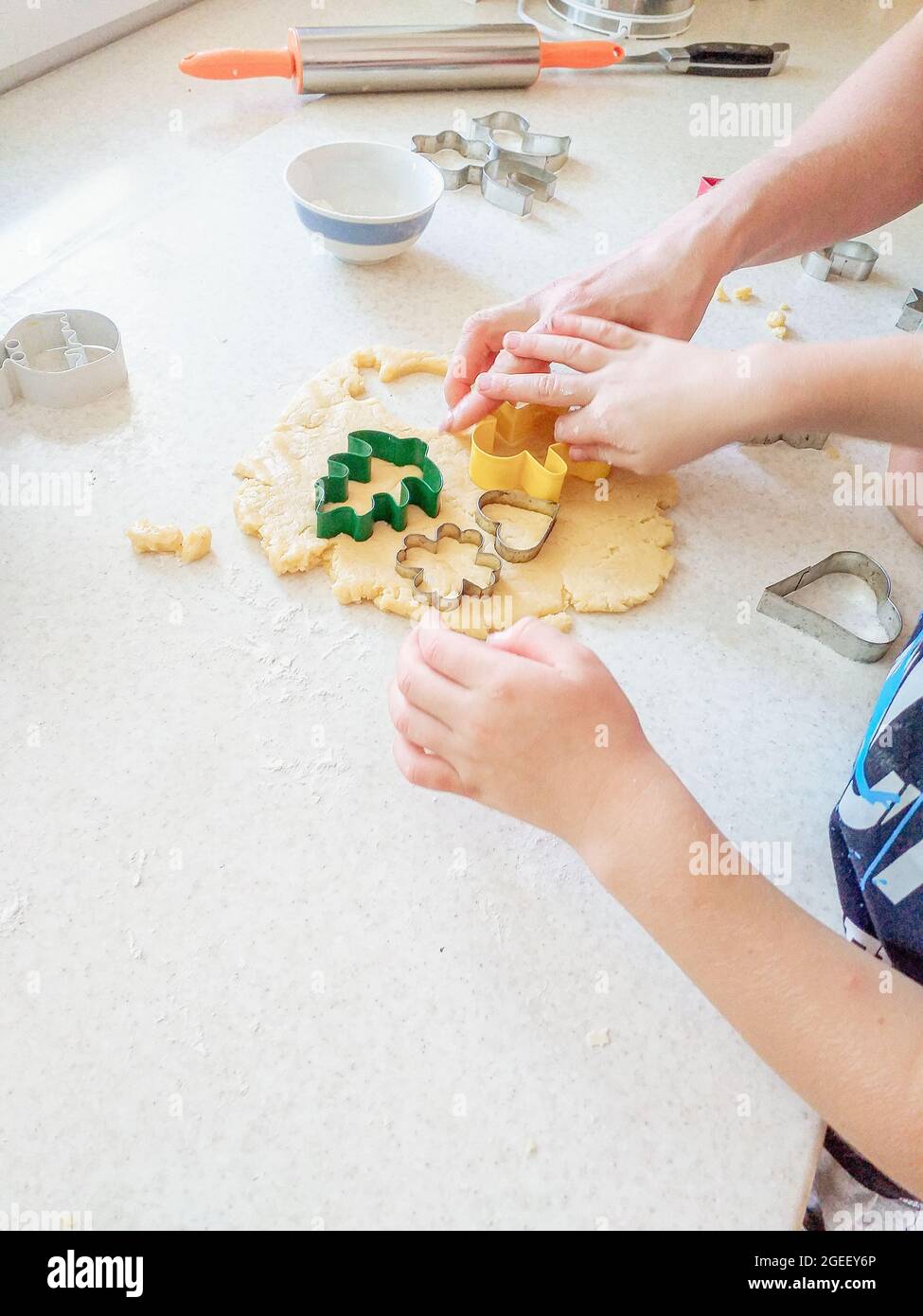 Process of cooking homemade cookies, using cookie cutters Stock Photo ...