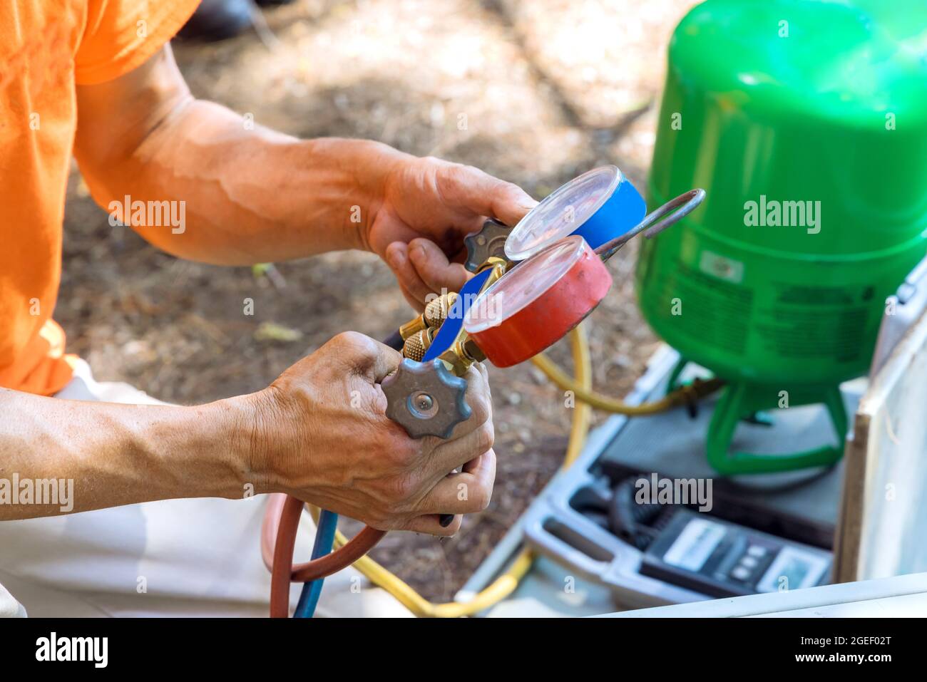 Hvac technician working commercial unit hi-res stock photography and ...