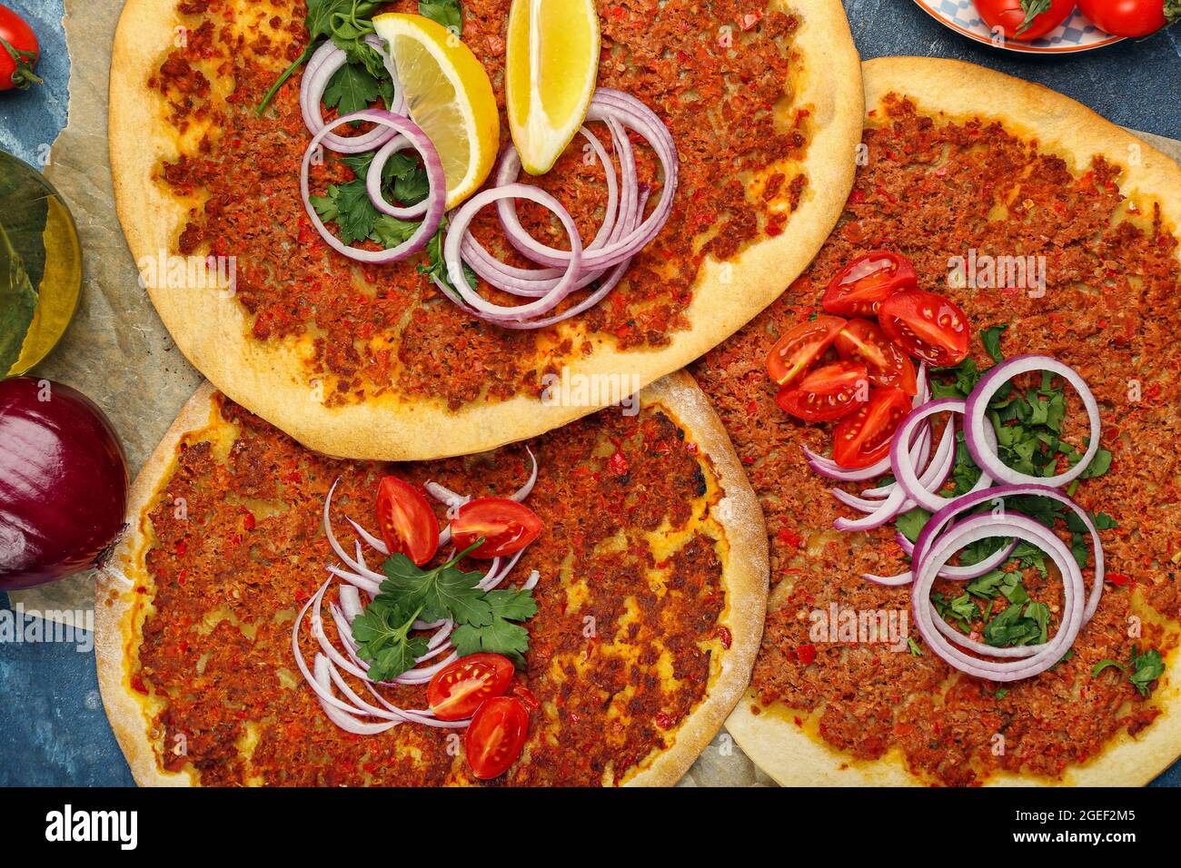 Delicious Turkish pizza on color background Stock Photo - Alamy