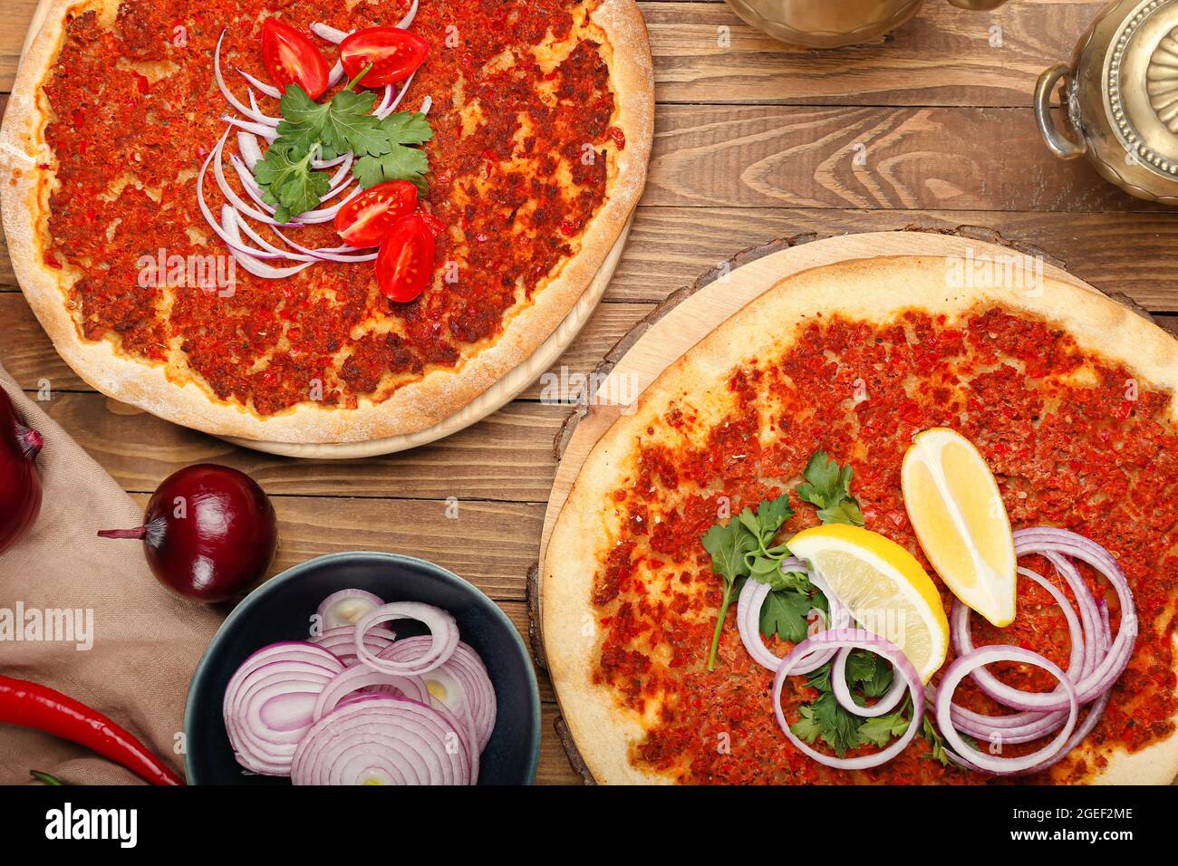Boards with delicious Turkish pizza on wooden background Stock Photo ...