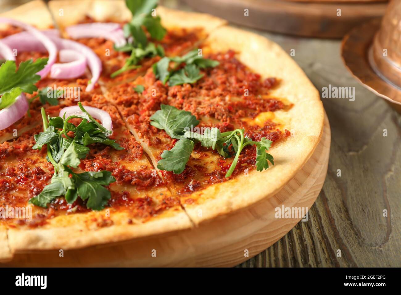 Delicious Turkish pizza on wooden background Stock Photo - Alamy