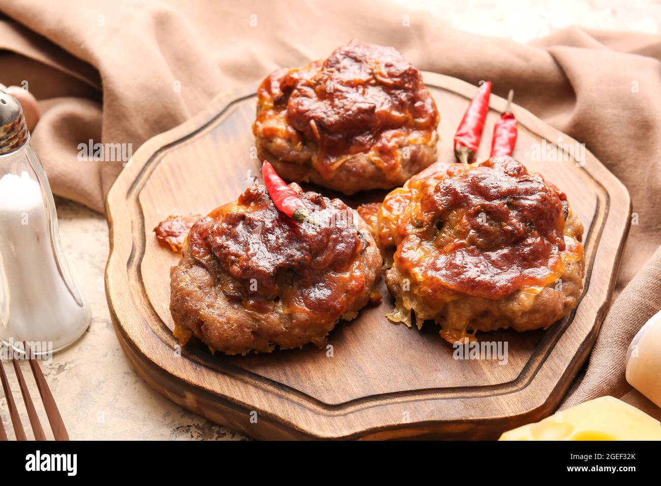 Wooden board with delicious minced meat boats on table Stock Photo - Alamy