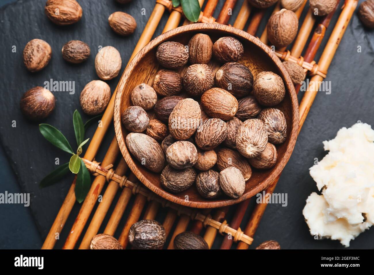 Bowl of shea nuts on table Stock Photo - Alamy