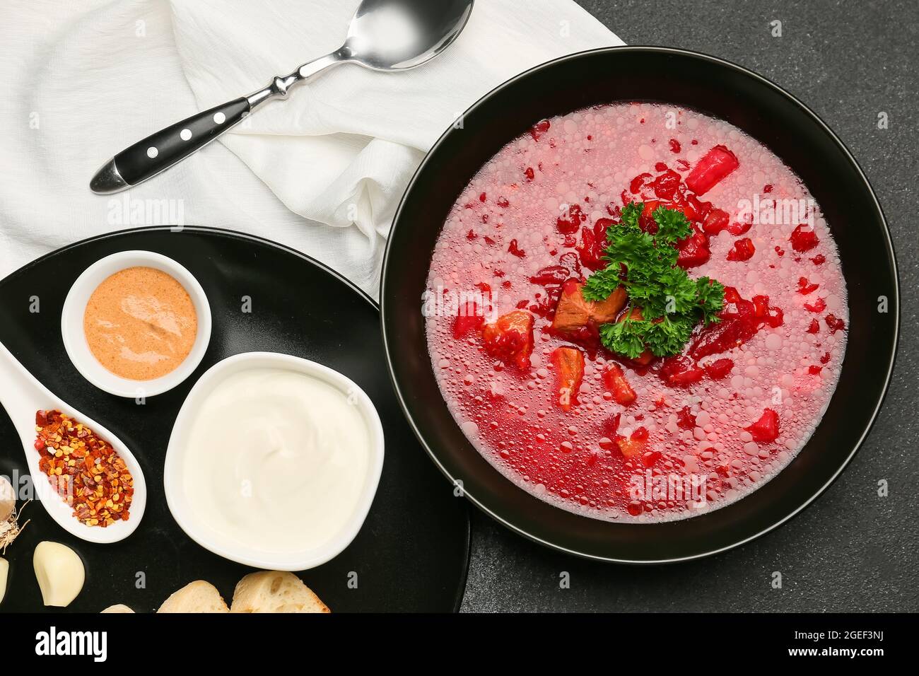 Composition with tasty borscht on dark background Stock Photo - Alamy