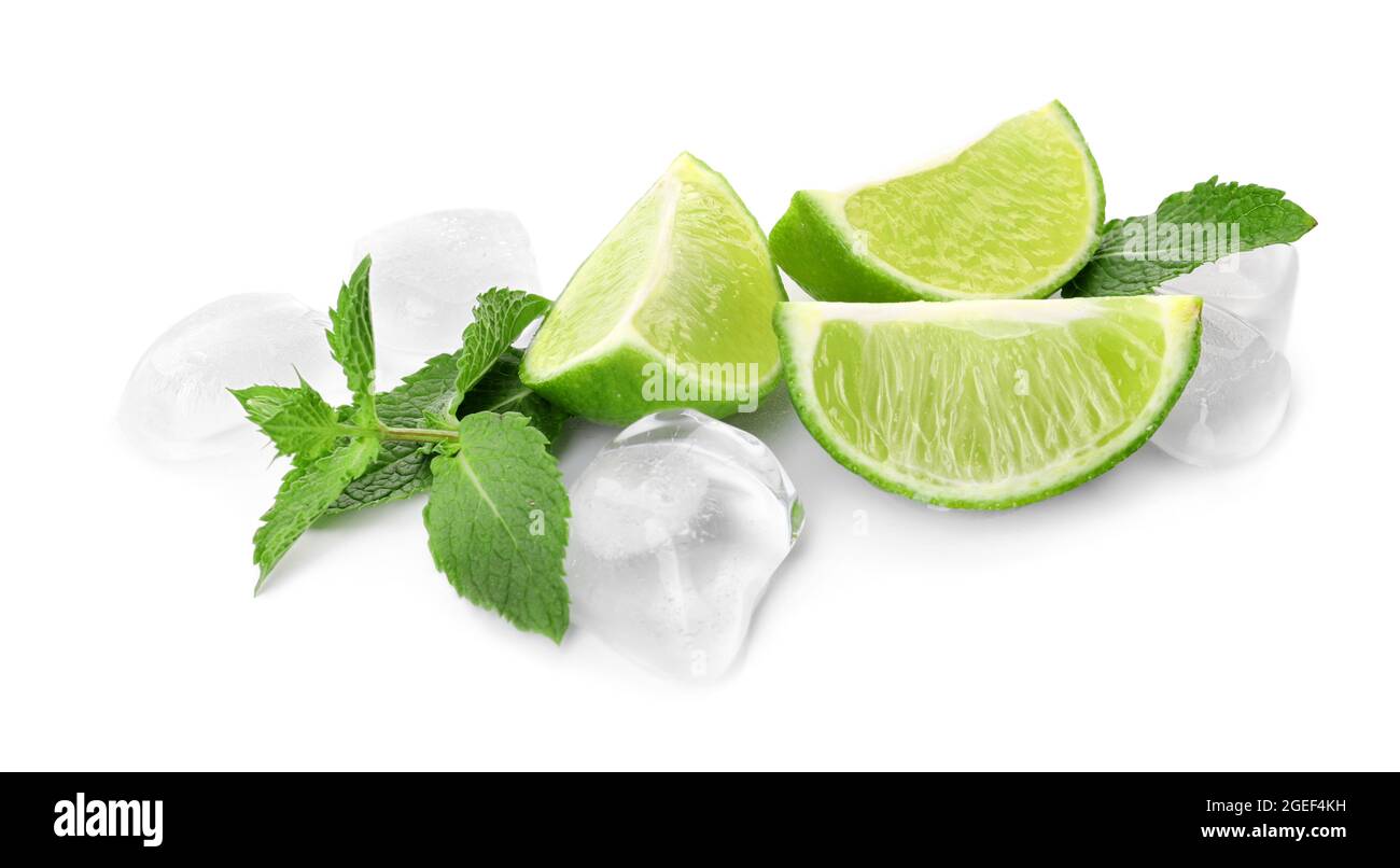 Tasty lime and ice cubes on white background Stock Photo - Alamy