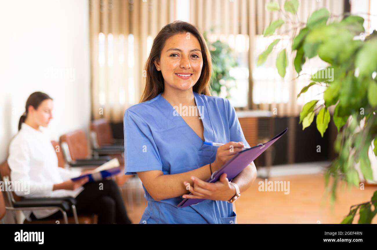 Confident woman doctor standing in office Stock Photo - Alamy