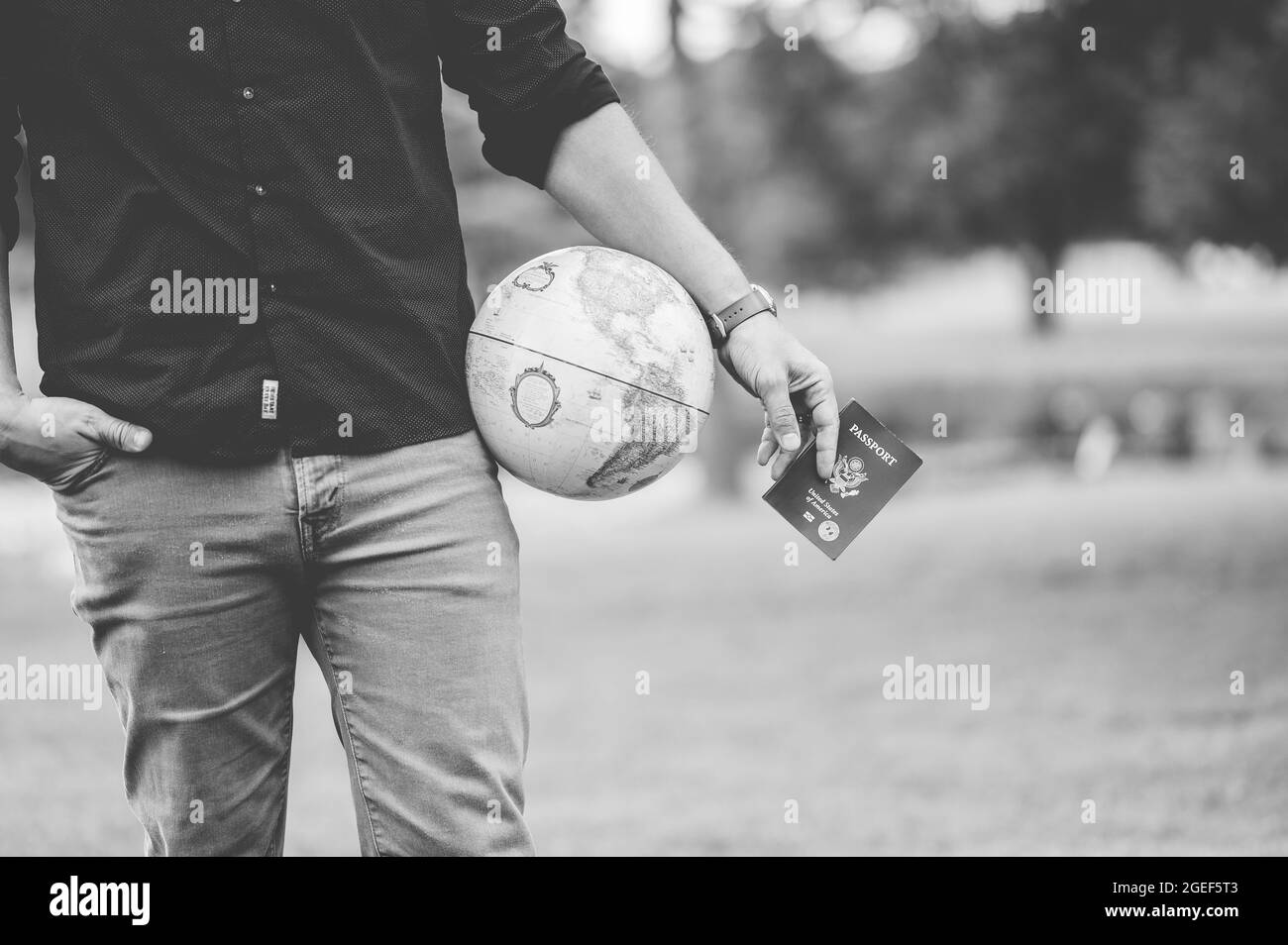 Old caucasian male holding Black and White Stock Photos & Images - Alamy