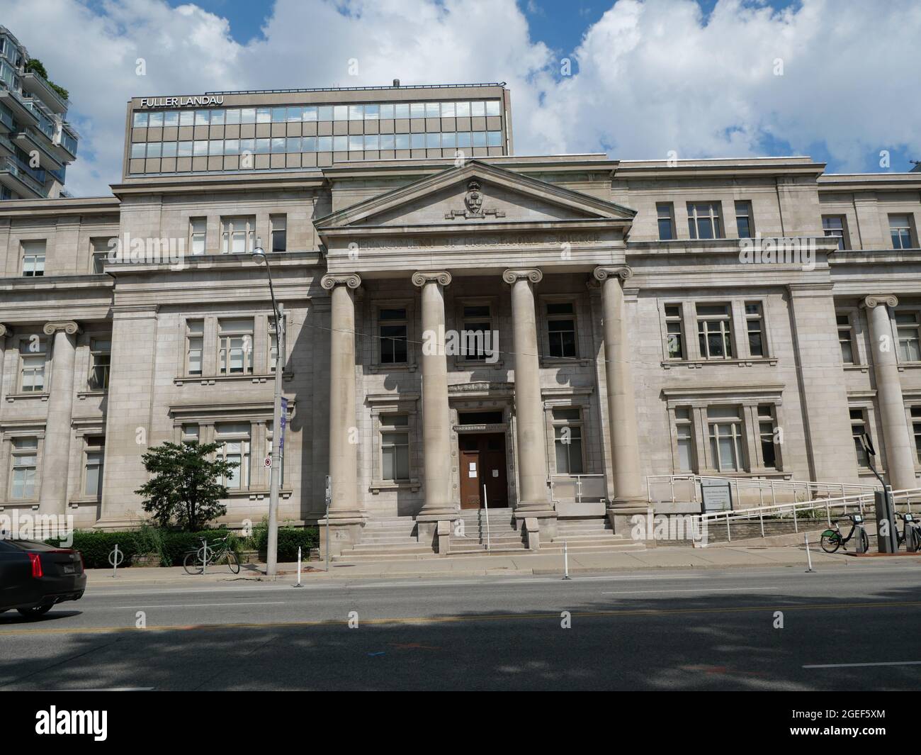 A classical stone building on the campus of the University of Toronto ...