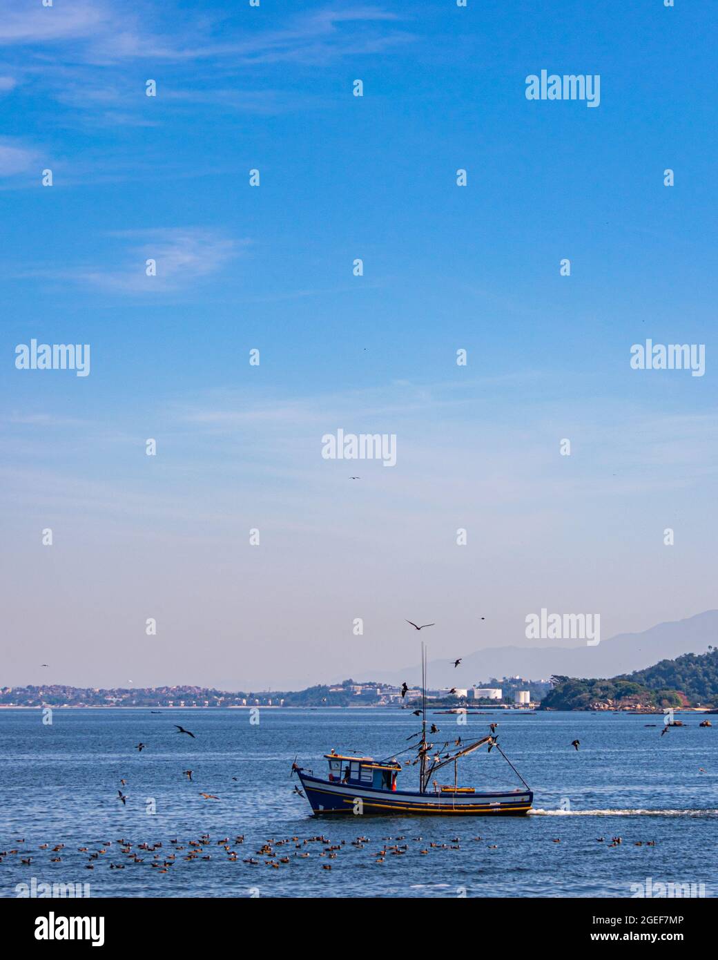 Rio de Janeiro, Brazil - CIRCA 2021: Fishing boat surrounded by ...