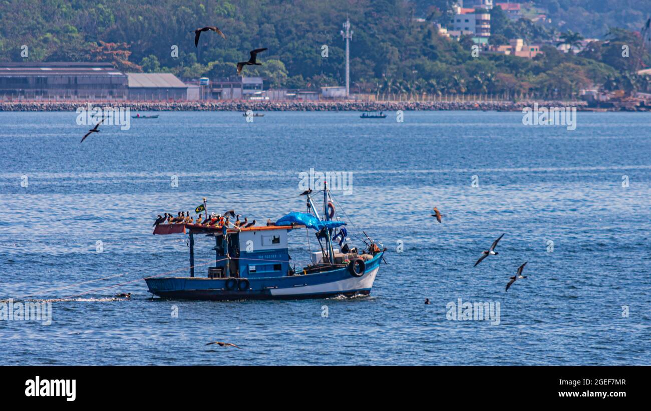 Rio de Janeiro, Brazil - CIRCA 2021: Fishing boat surrounded by ...