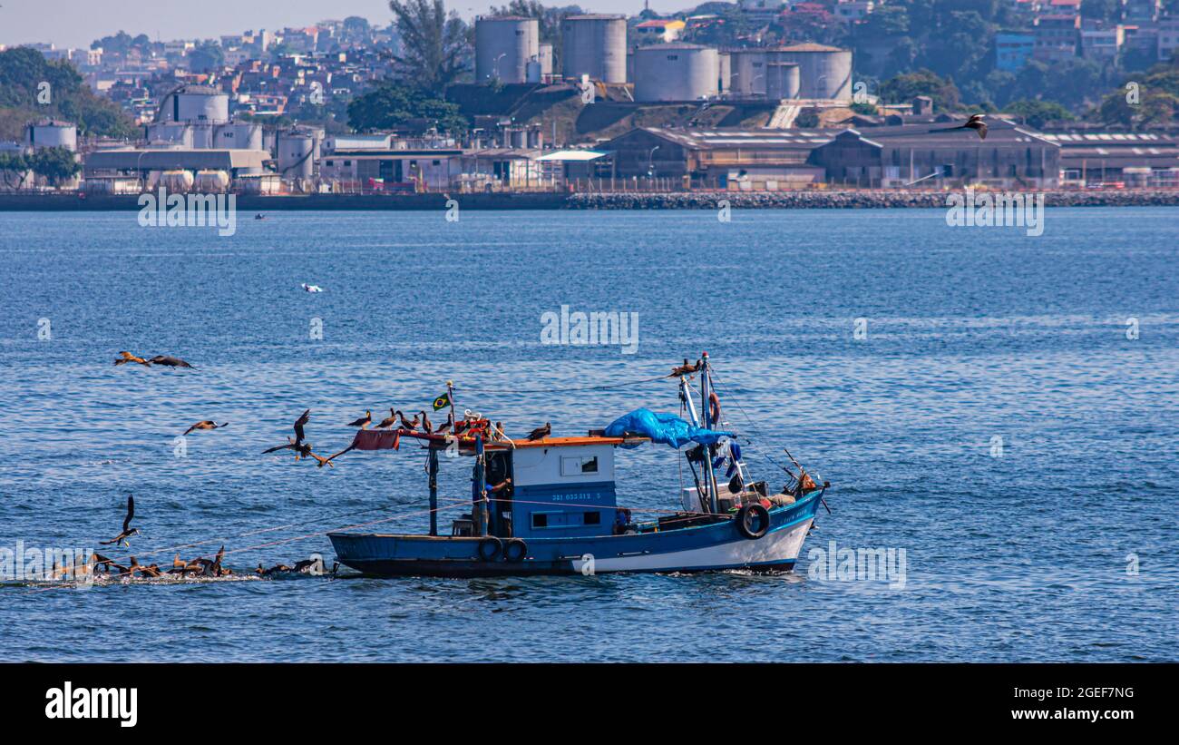 Rio de Janeiro, Brazil - CIRCA 2021: Fishing boat surrounded by ...