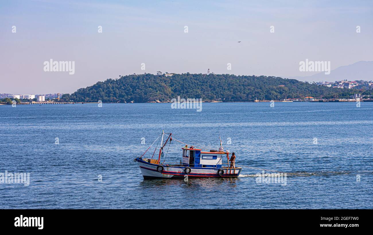Rio de Janeiro, Brazil - CIRCA 2021: Fishing boat surrounded by ...