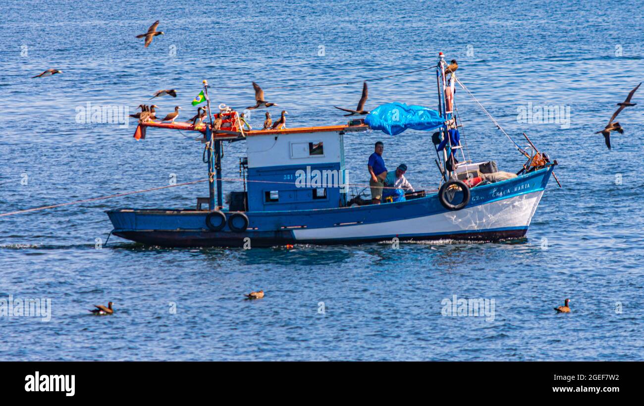 Rio de Janeiro, Brazil - CIRCA 2021: Fishing boat surrounded by ...