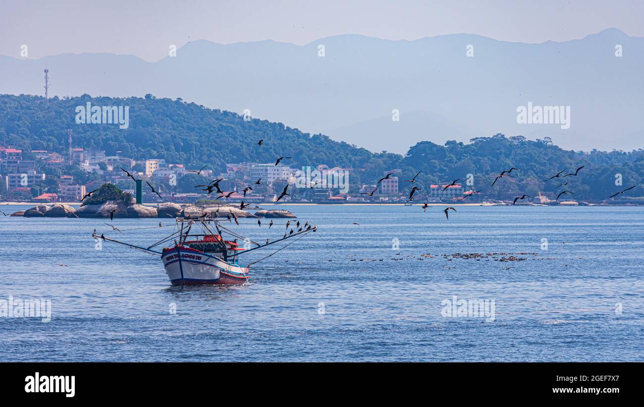 Rio de Janeiro, Brazil - CIRCA 2021: Fishing boat surrounded by ...