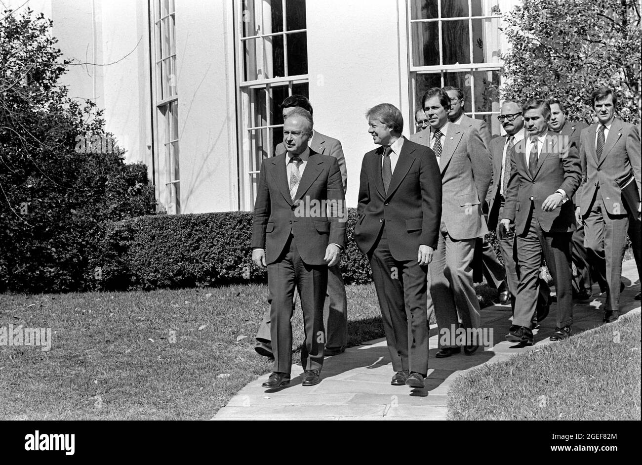 United States President Jimmy Carter walks Prime Minister Yitzhak Rabin ...