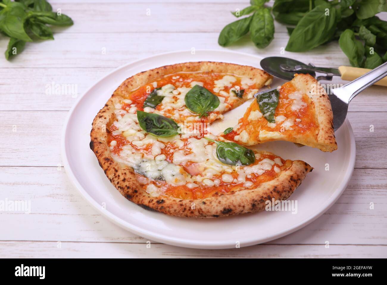 Close up picking pizza hi-res stock photography and images - Alamy