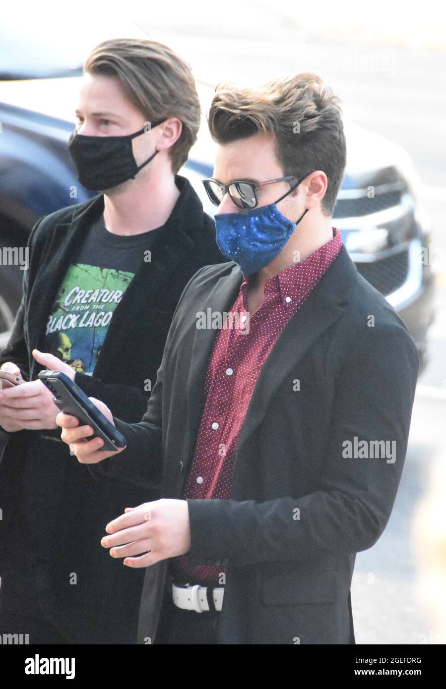 Los Angeles, California, USA 19th August 2021 Actor Will Sherrod and actor/author Chris Colfer ...