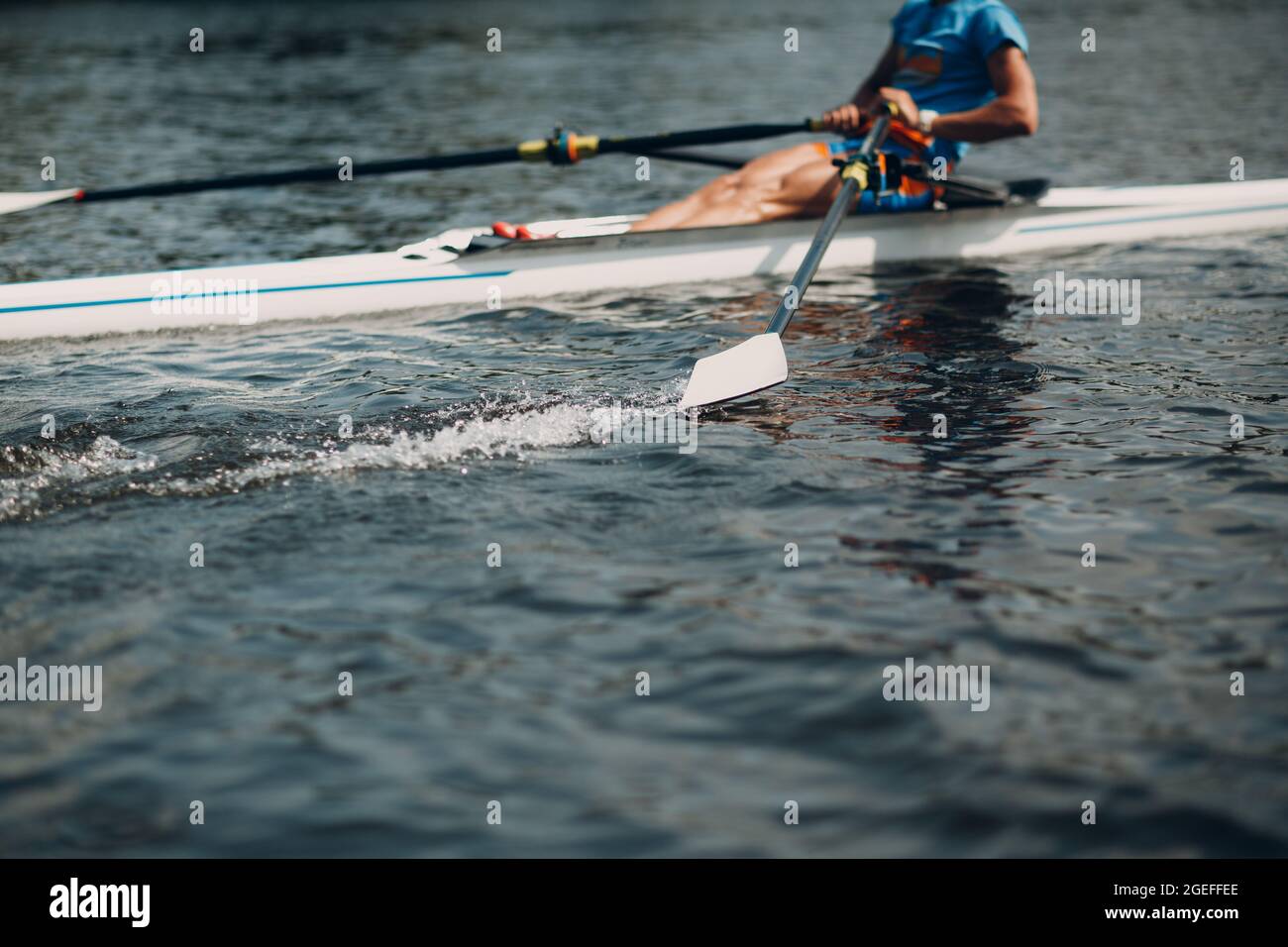 Sportsman single scull man rower rowing on boat. Oar paddle water ...