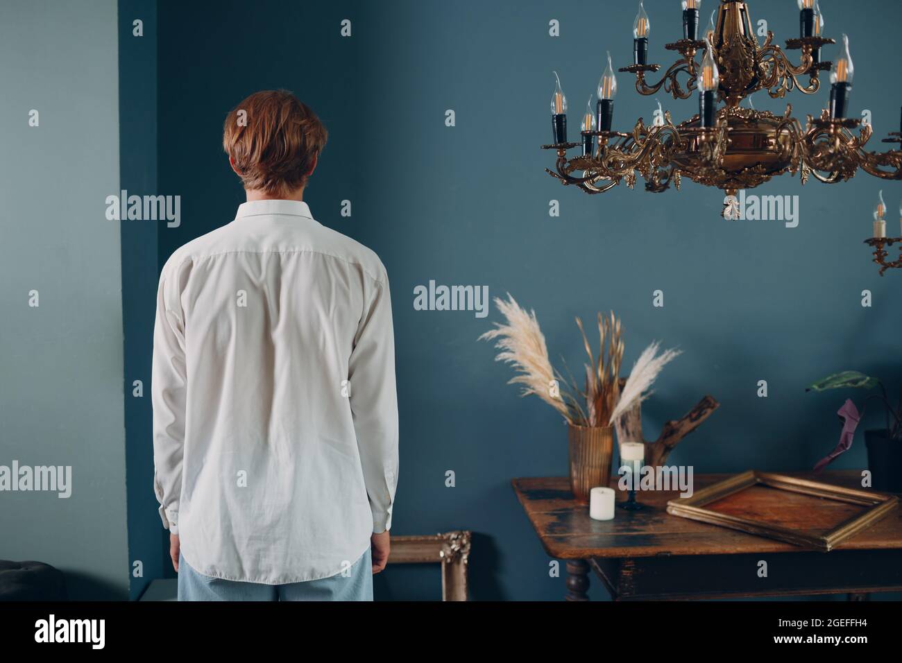 Portrait european young man standing back rear view turned away Stock ...