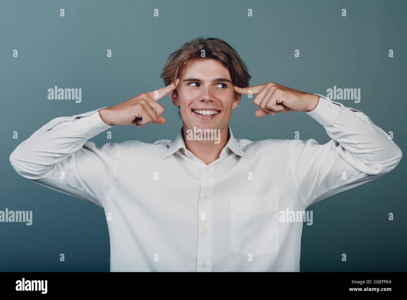 Portrait european young positive thinking man portrait with hand ...