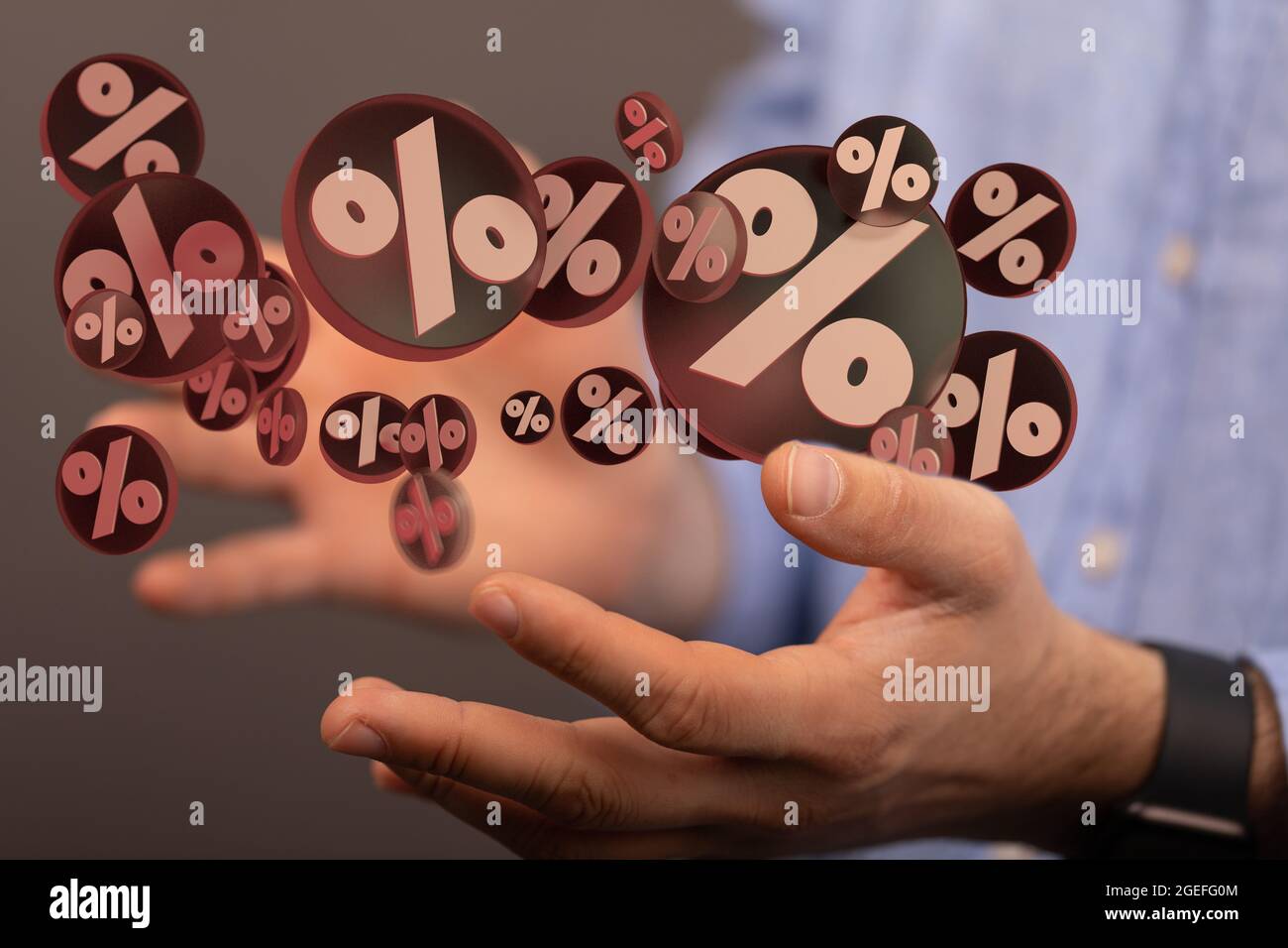 3D render of floating percentage symbols over a businessman's hands ...