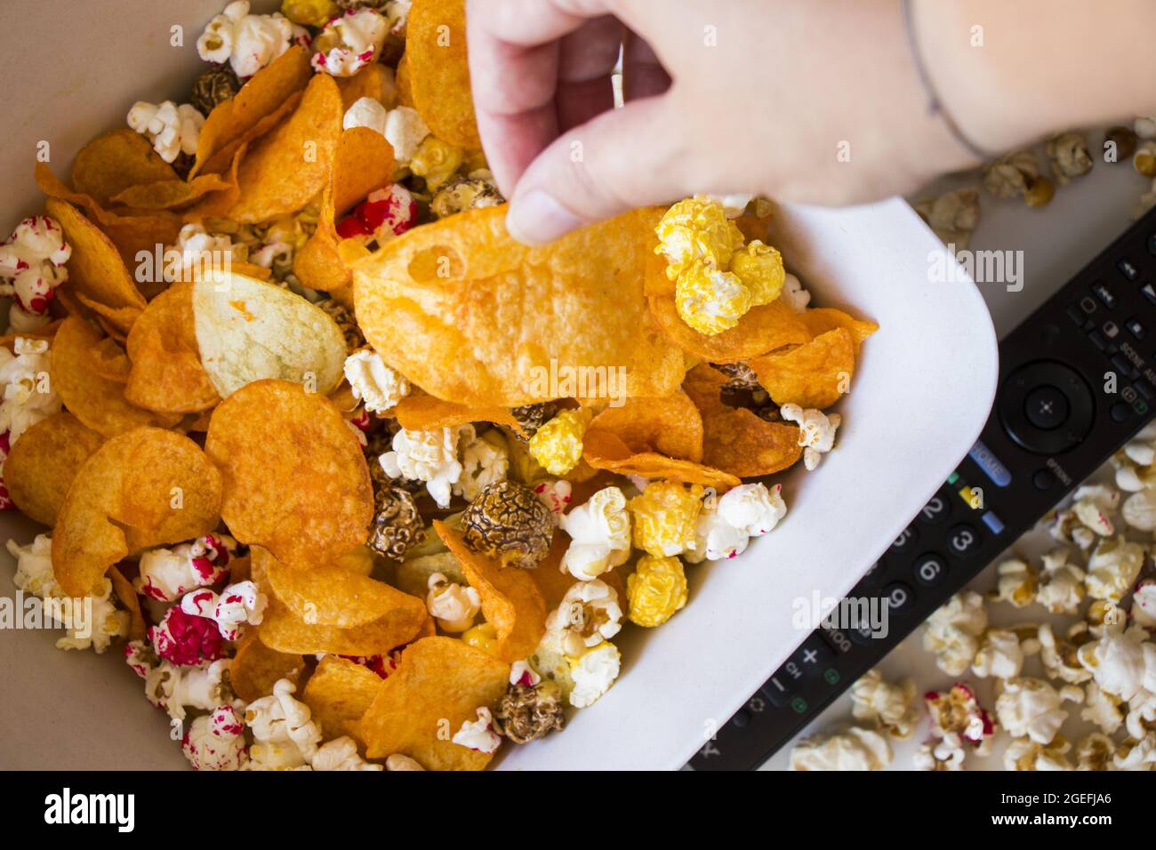 Picking popcorn hi-res stock photography and images - Alamy
