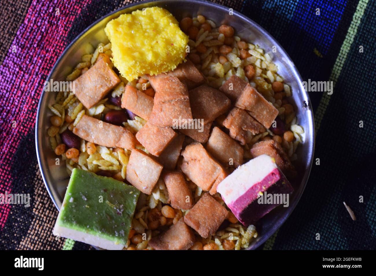Indian breakfast milk sweets and snacks colorful cloth in the ...