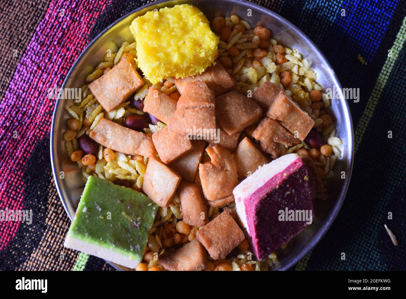 Indian breakfast milk sweets and snacks colorful cloth in the ...