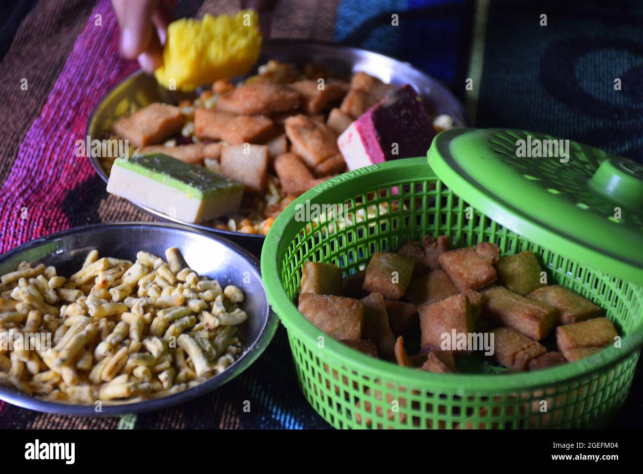 Indian breakfast milk sweets and snacks colorful cloth in the ...