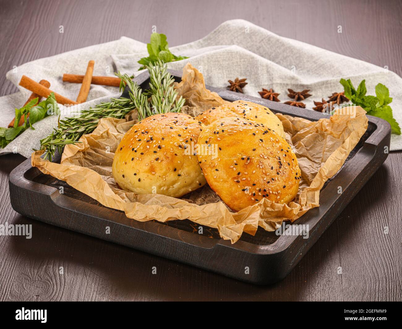 Traditional Uzbek round bread homemade bakery Stock Photo - Alamy