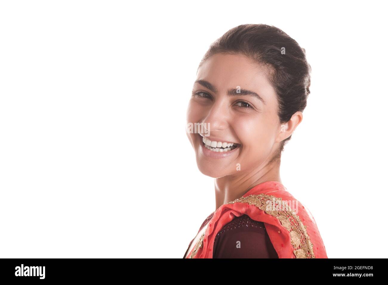 Portrait of young adult indian woman laughting in sari isolated white ...
