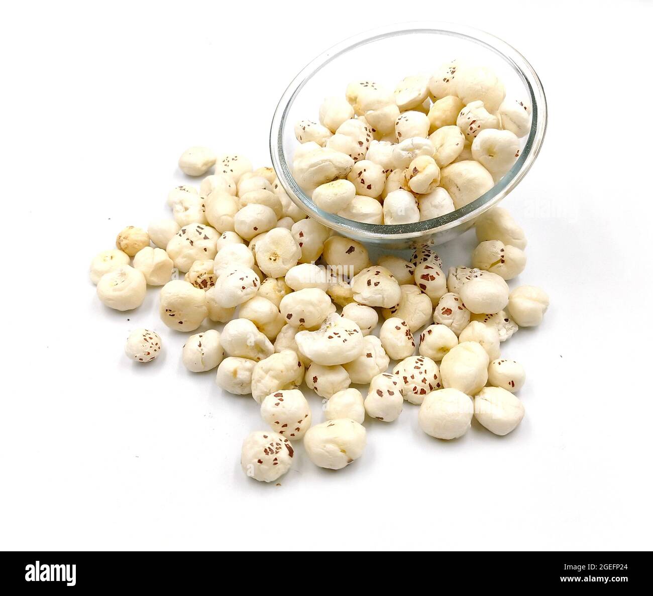 Closeup shot of crispy lotus pops seeds served in a glass bowl on a ...