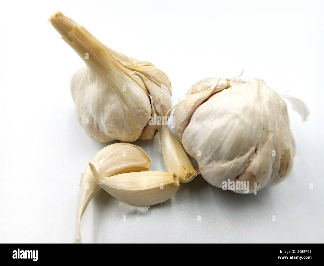 Closeup shot of garlic cloves isolated on a white background Stock ...