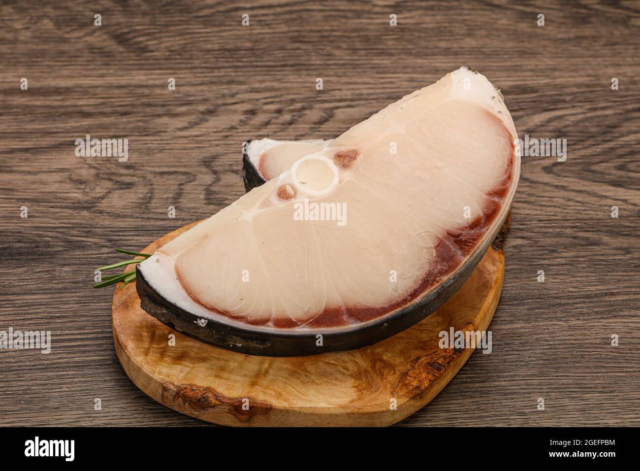 Raw shark steak served rosemary for cooking Stock Photo - Alamy