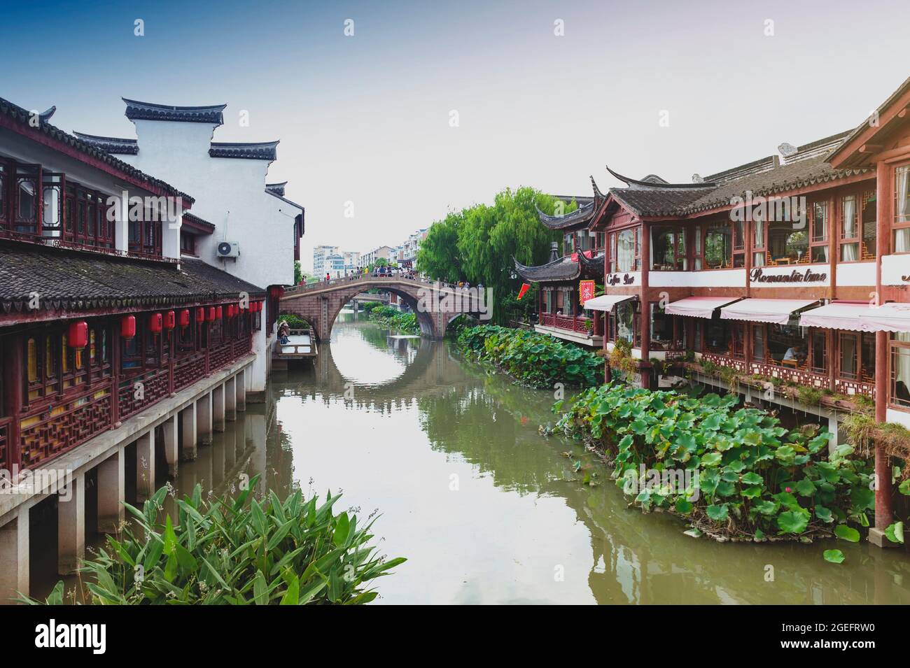 Traditional Chinese teahouses and buildings along the riverbank of the ...