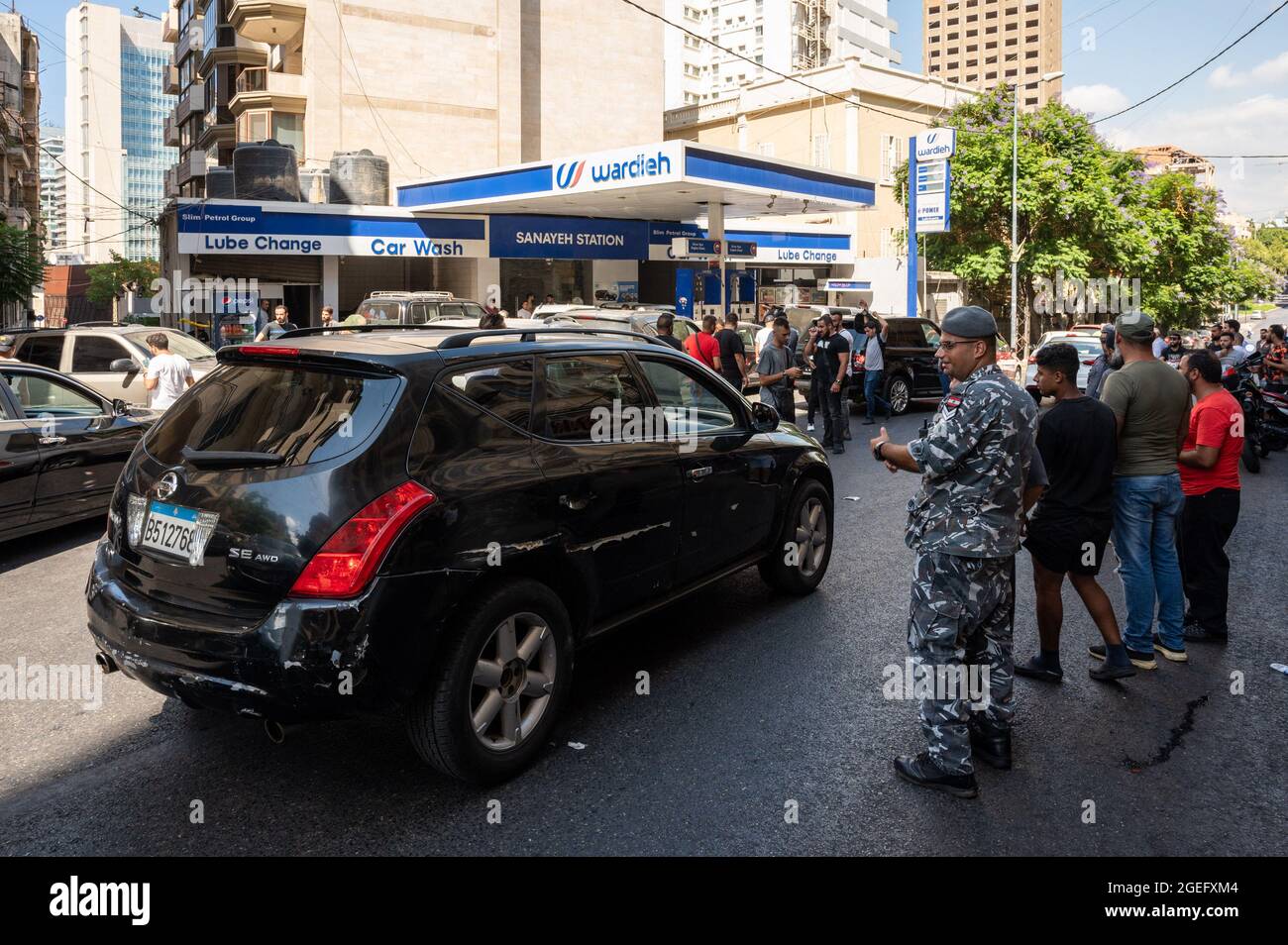 Chaos and soldiers as hundreds of Lebanese wait in line for fuel at a ...