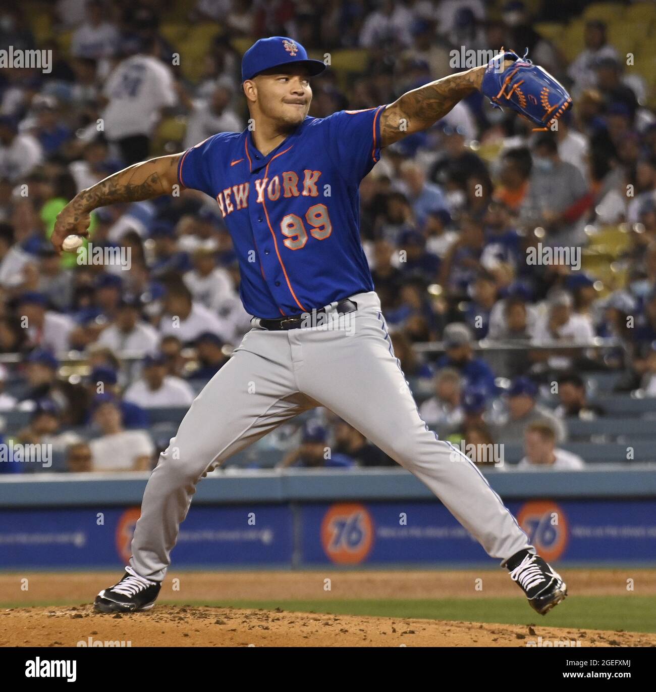 Los Angeles, USA. 20th Aug, 2021. New York Mets' starting pitcher Taijuan Walker winds up to ...