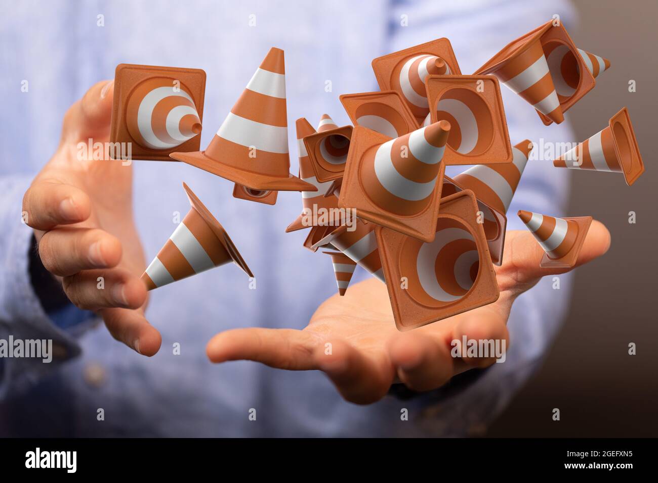 3D rendered traffic cones held in person's hand Stock Photo - Alamy