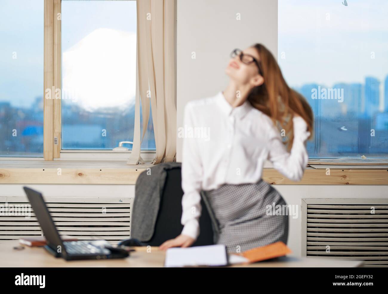 woman secretary in office work posing professional Stock Photo - Alamy