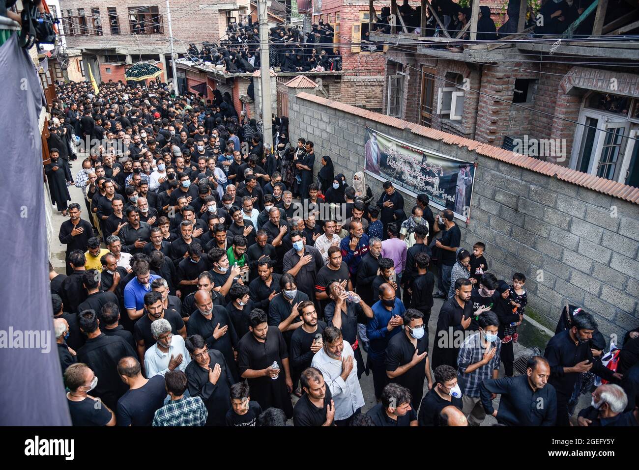 Kashmiri Shia Muslims beat their chests as they mourn during the Ashura ...